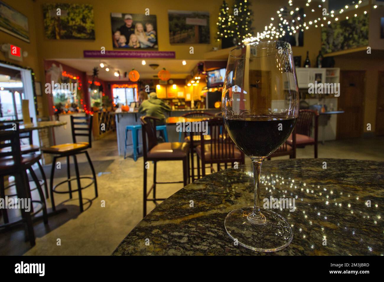 A Half Full Wine Glass on a Table at Yellowstone Cellars and Winery in ...