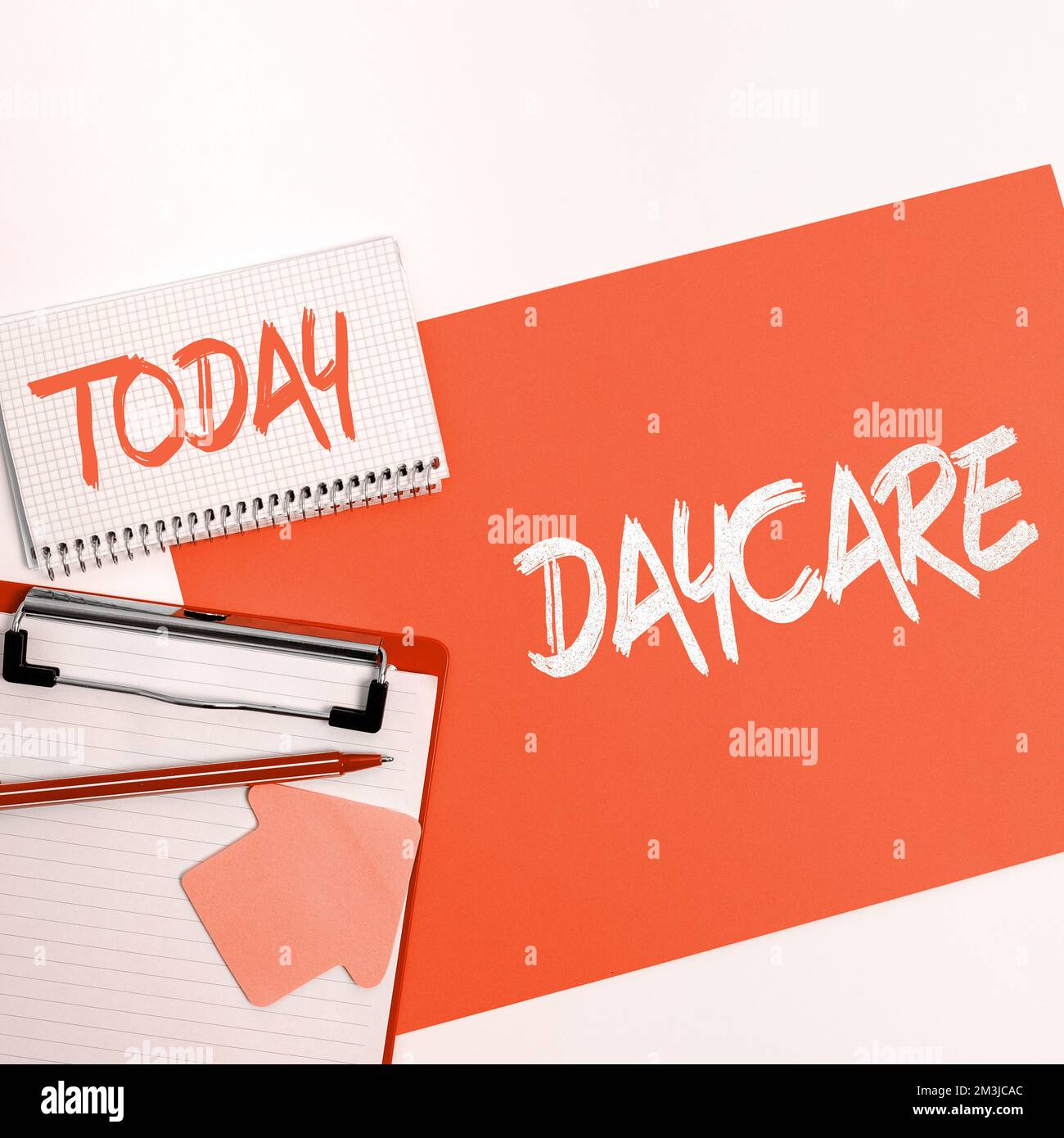 Hand writing sign Daycare. Word Written on offering care to preschool ...