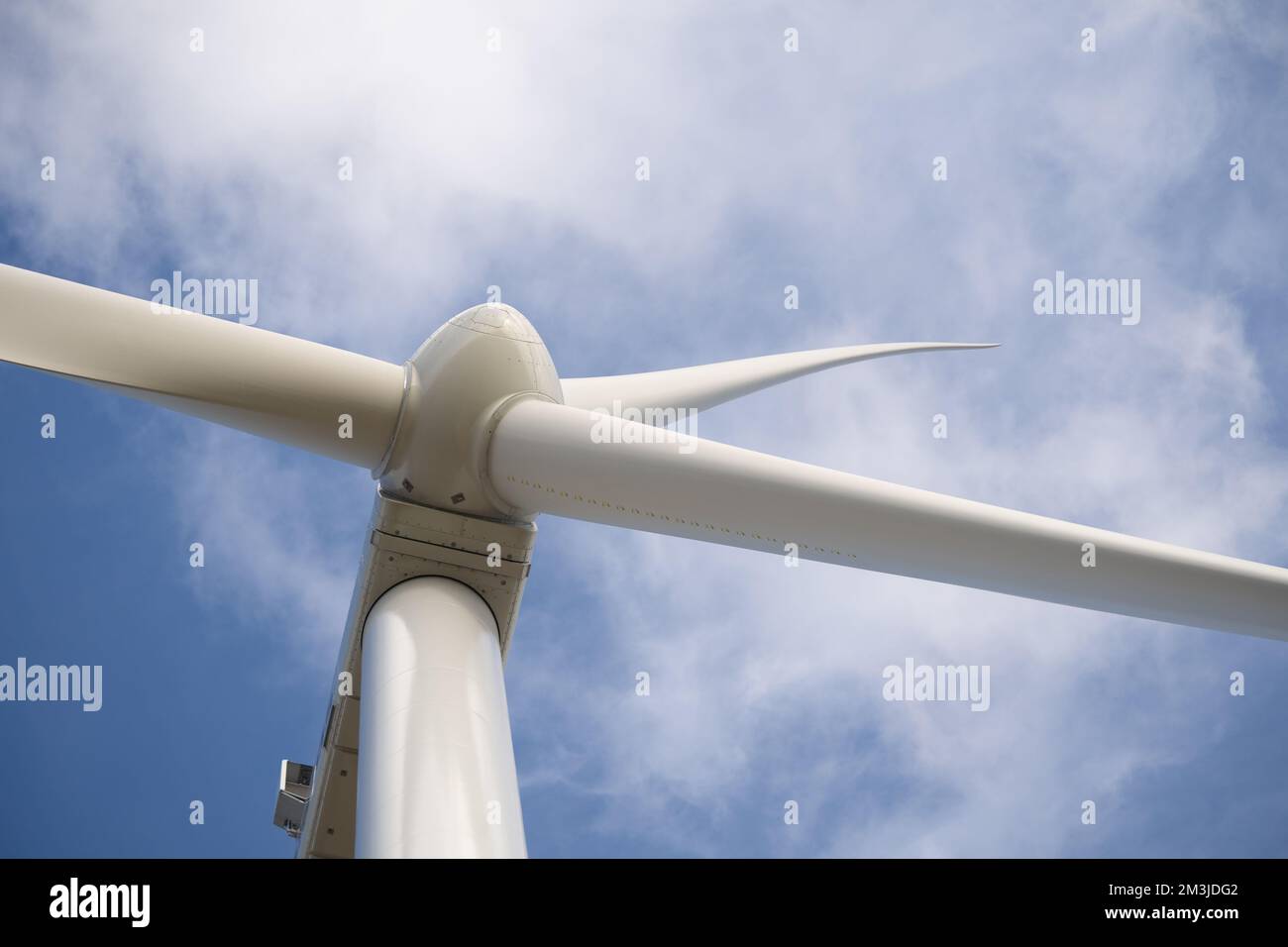 Wind Turbine Propeller Spinning Against Blue Sky With Clouds.wide Stock ...