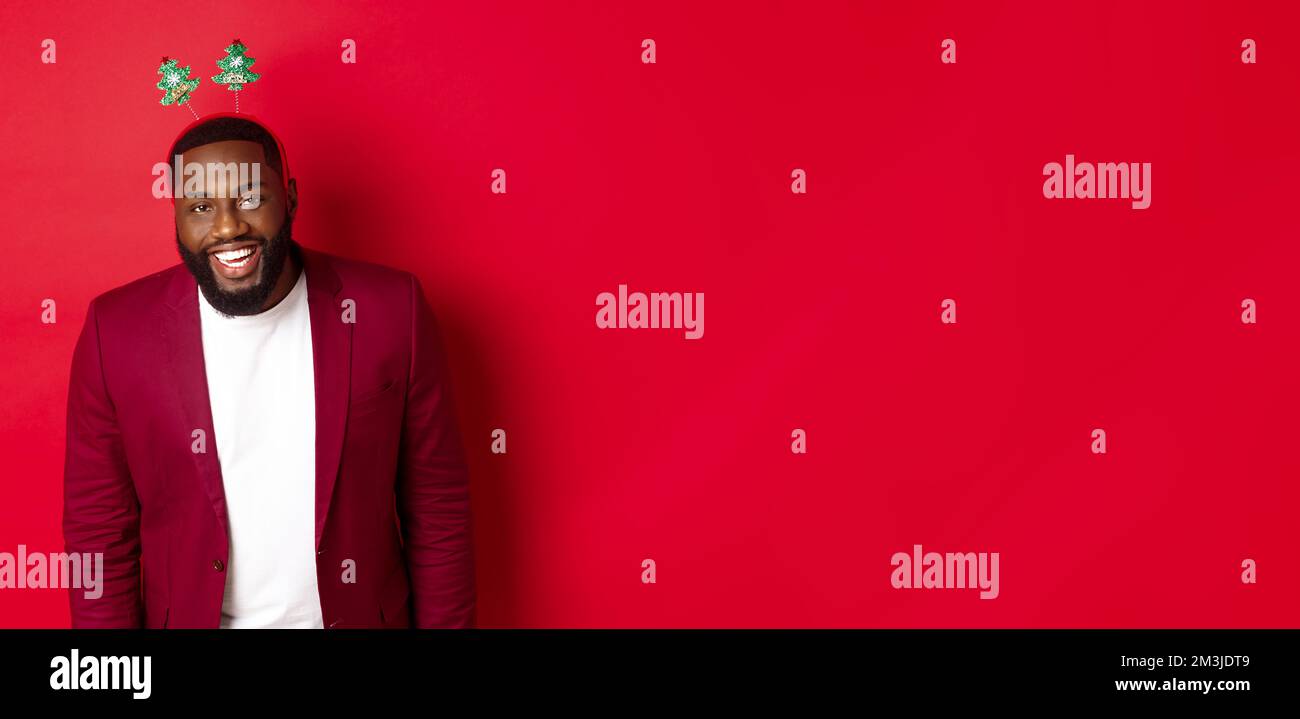 Merry Christmas. Handsome african american man in blazer and party ...
