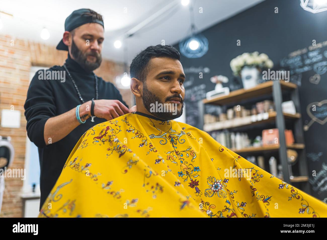 Hair cutting cape hi-res stock photography and images - Alamy