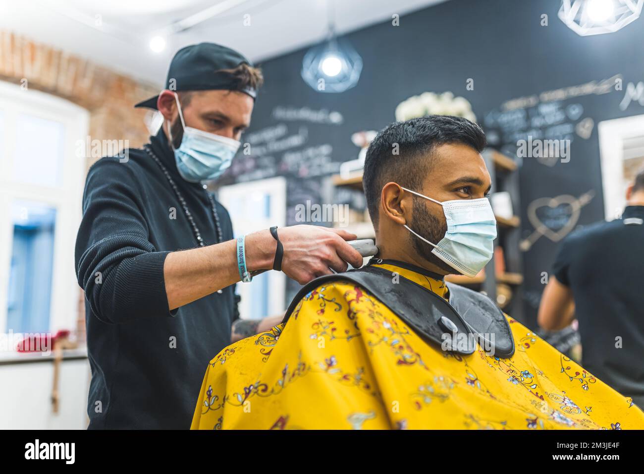 Indian Adult Man At Barbershop Professional Caucasian Male Barber