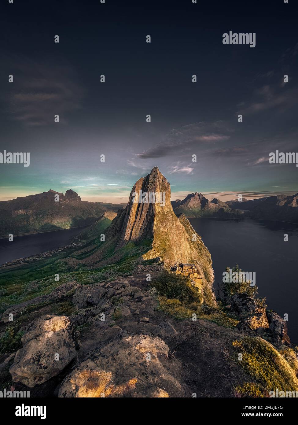 Epic dark landscape of Mount Segla viewed from Mount Hesten after ...