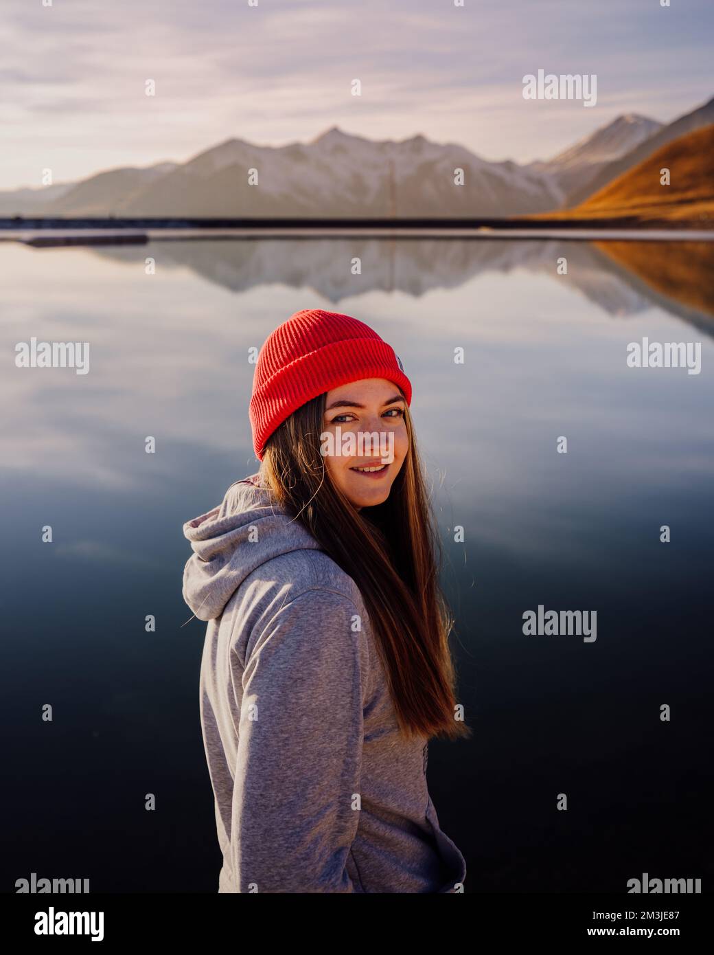 Girl in red hat portrait in mountains near Cristal lake Stock Photo - Alamy
