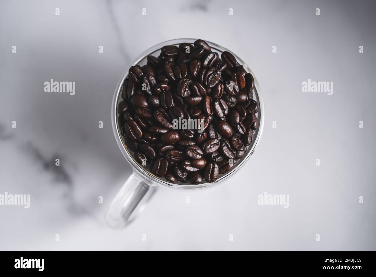 Coffee Bean s in Glass Mug, Overhead View Stock Photo - Alamy