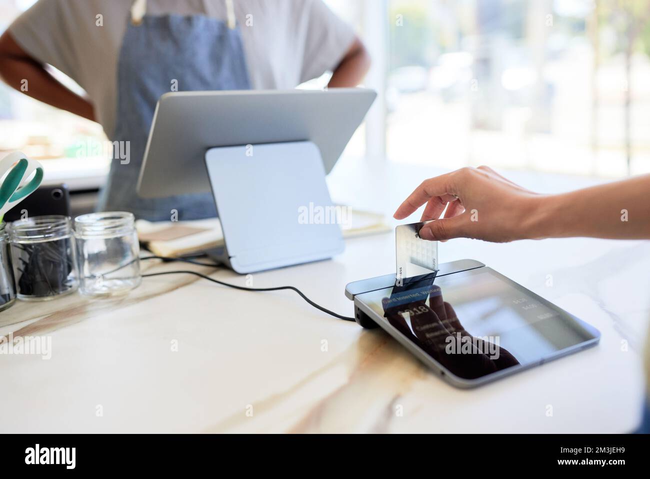 Asian woman cashier hi-res stock photography and images - Alamy
