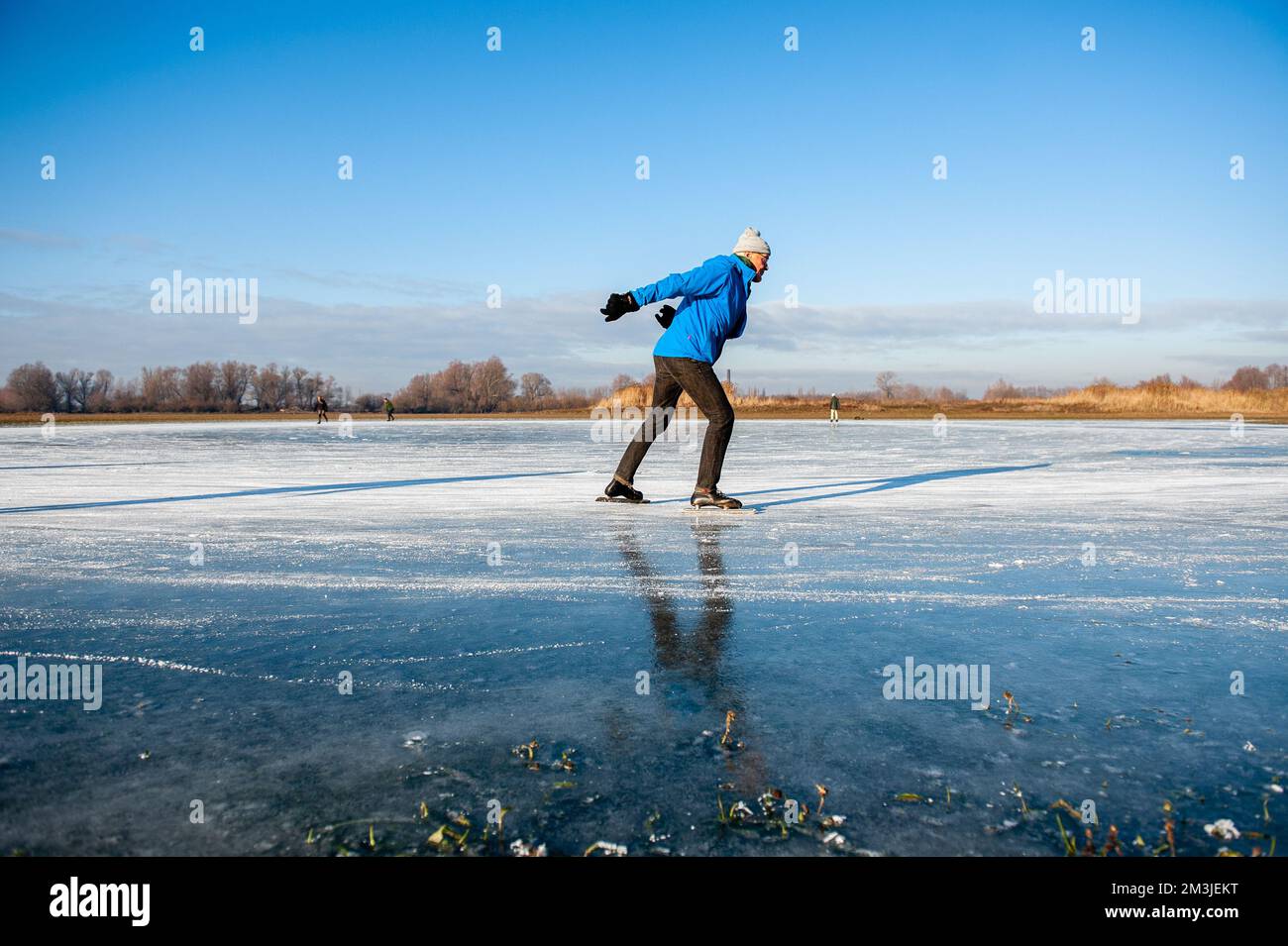 Nijmegen, Netherlands. 15th Dec, 2022. An old man is seen skating on ...