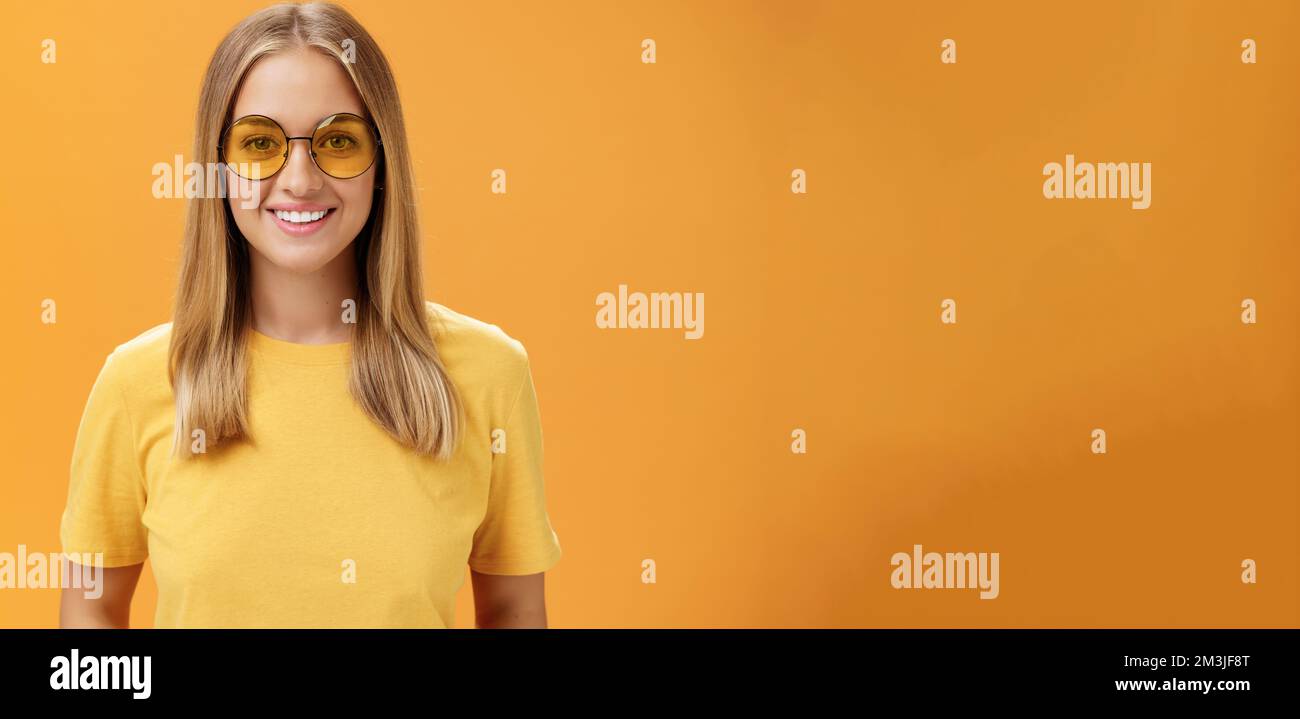 Stylish self-assured charming european woman with fair hair and tanned ...