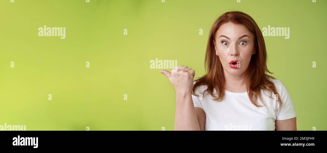 Close Up Surprised Amused Redhead Middle Aged Housewife Folding Lips