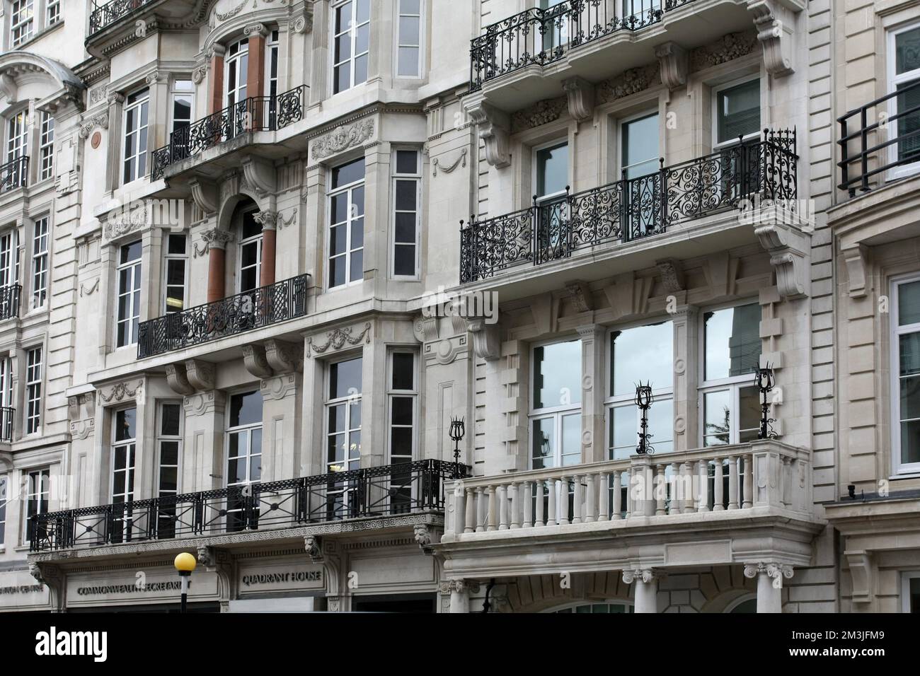 Balconies of ornate baroque style apartment buildings, London, England ...