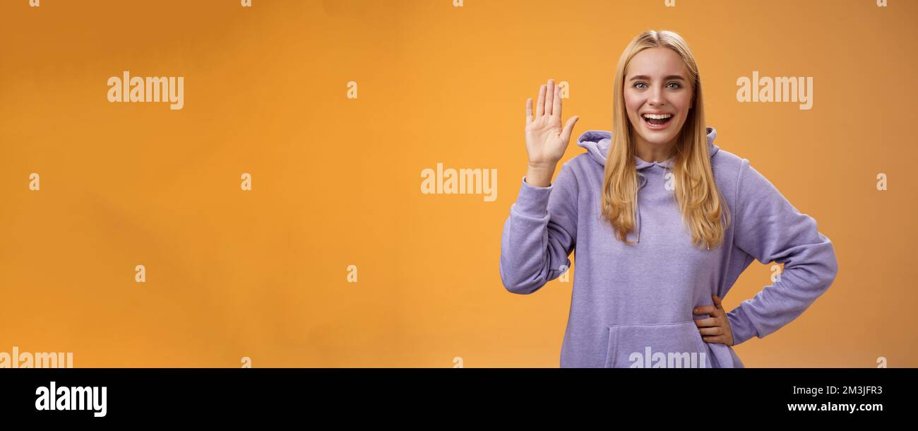 Friendly energized helpful charming female student say hello newcomers ...