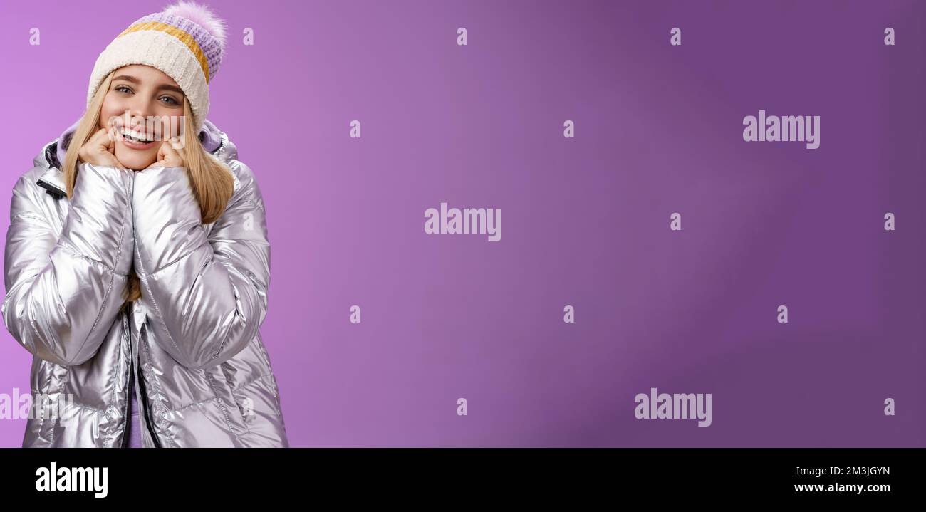 Delighted charming tender female in stylish cute hat silver shiny ...