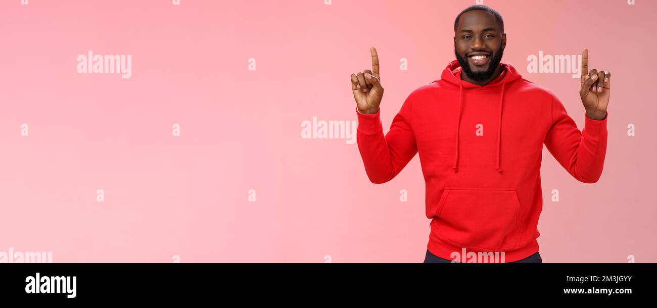 Devious cute african-american bearded guy in red hoodie smiling ...
