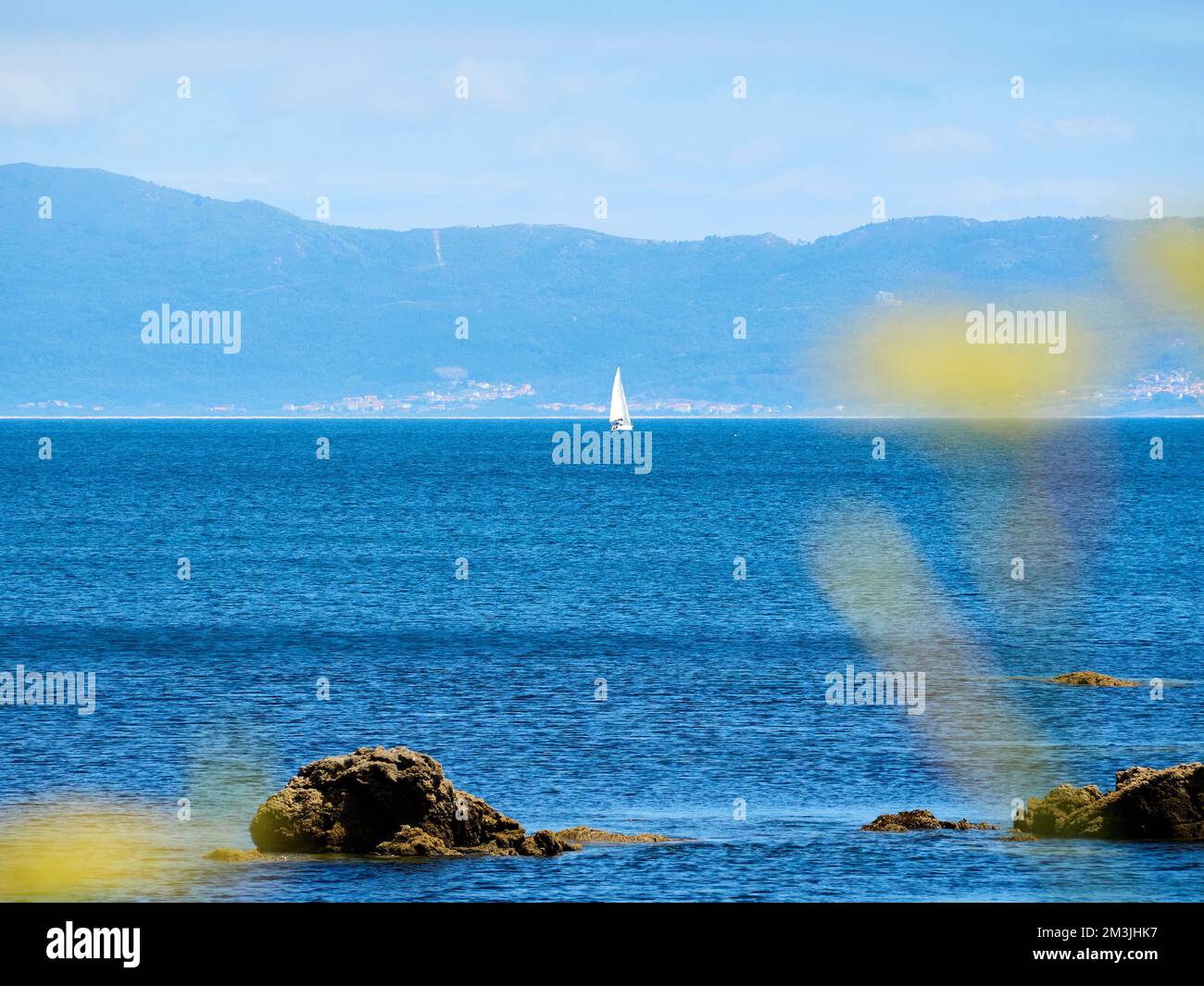 An illustration of a bright seascape view with a white boat flowing ...