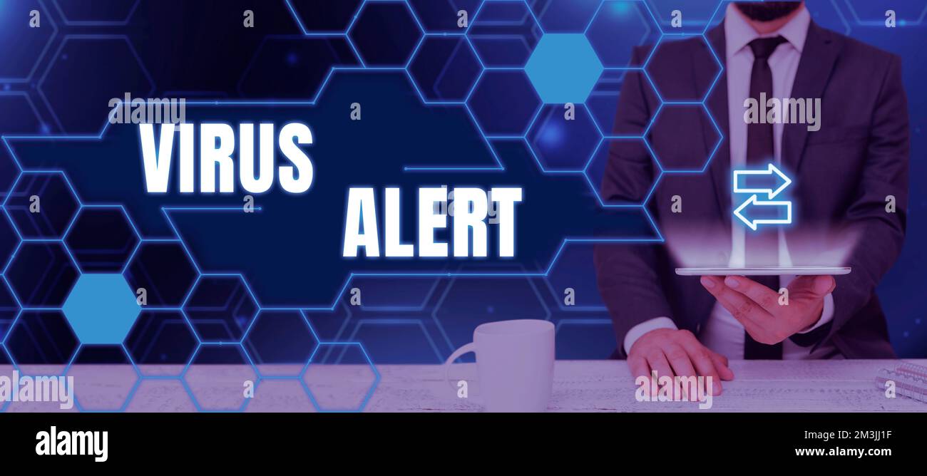 Conceptual caption Virus Alert. Word Written on message warning of a ...