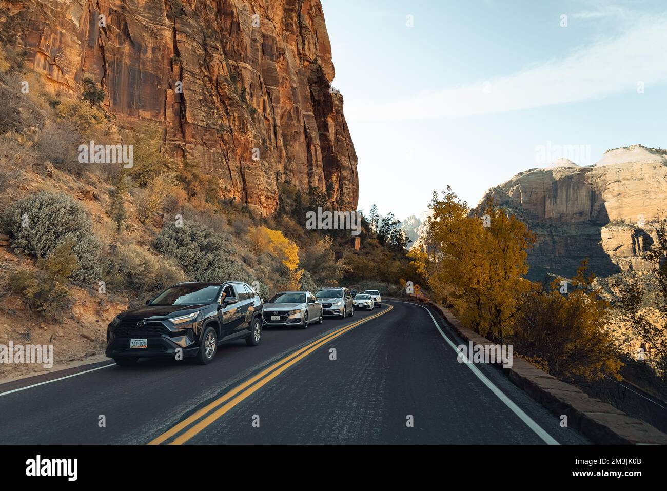 People waiting in line to exit Zion National Park in Utah on the east ...
