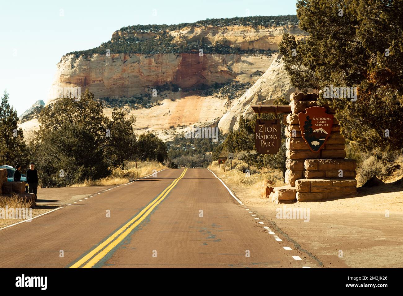 The main entrance sign into zion national park as you drive into the ...