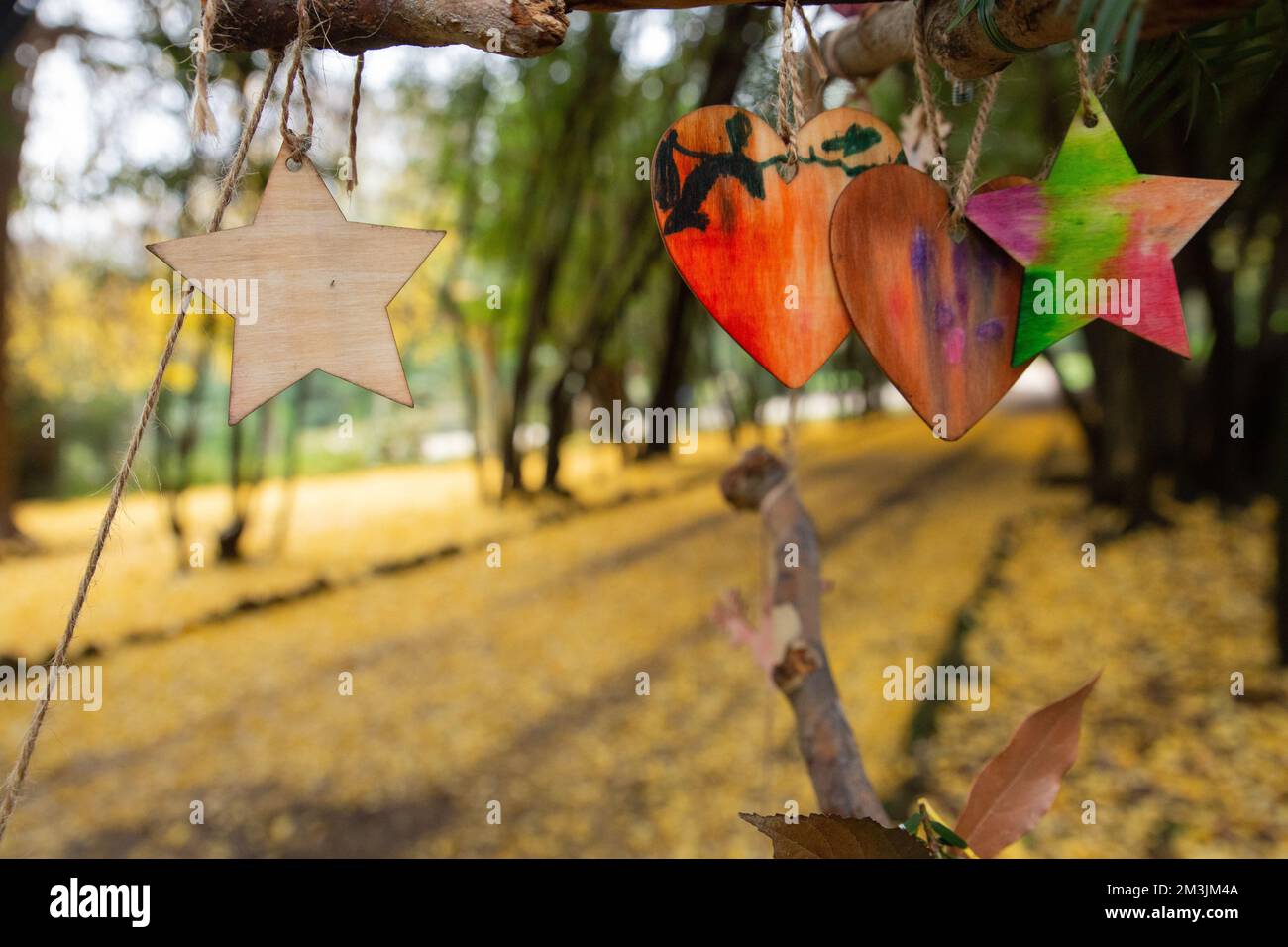 Rome, RM, Italy. 15th Dec, 2022. Wood figures hanging from a tree on ...