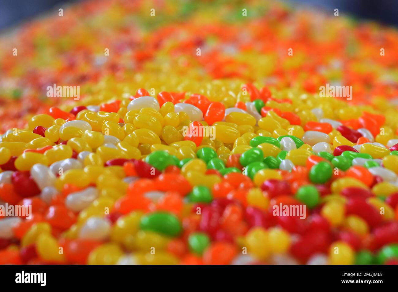 various colored Gummies stored in a candy factory Stock Photo - Alamy
