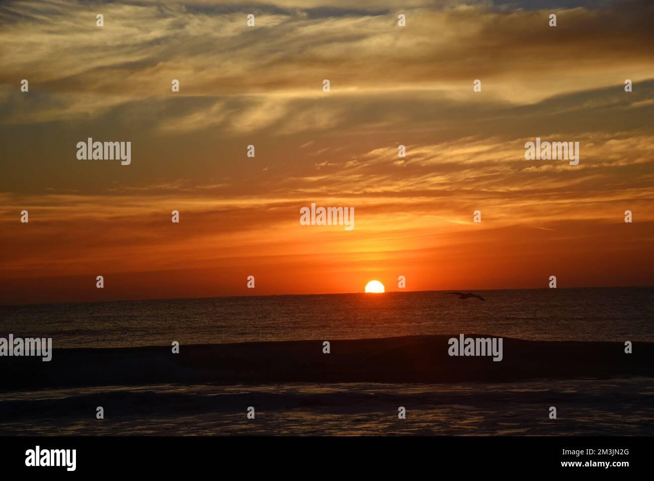 General view of the sunset on the heavenly Mazunte beach, a beautiful ...