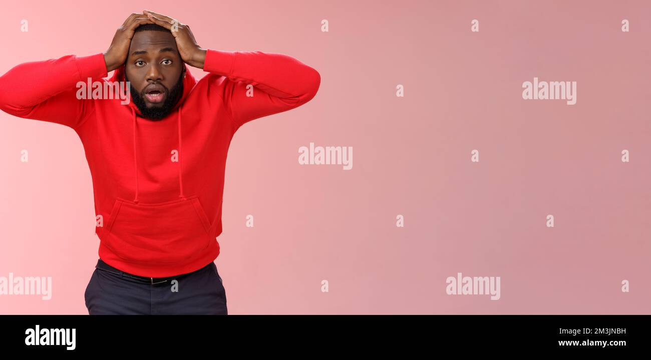 African-american man shocked speechless look upset stupor hold hands ...