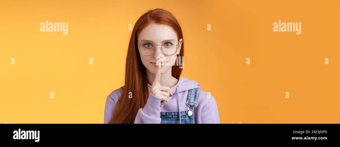 Shh secret safe. Young sensual mysterious redhead attractive woman ...