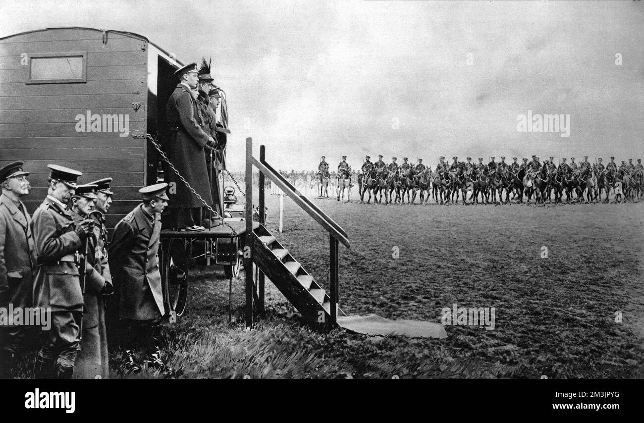Queen Mary inspecting troops Stock Photo - Alamy