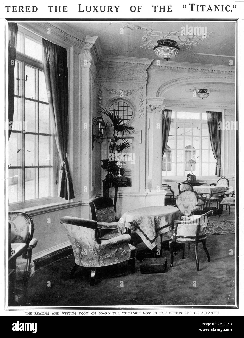 Photograph of the reading and writing room onboard the Titanic. Built ...