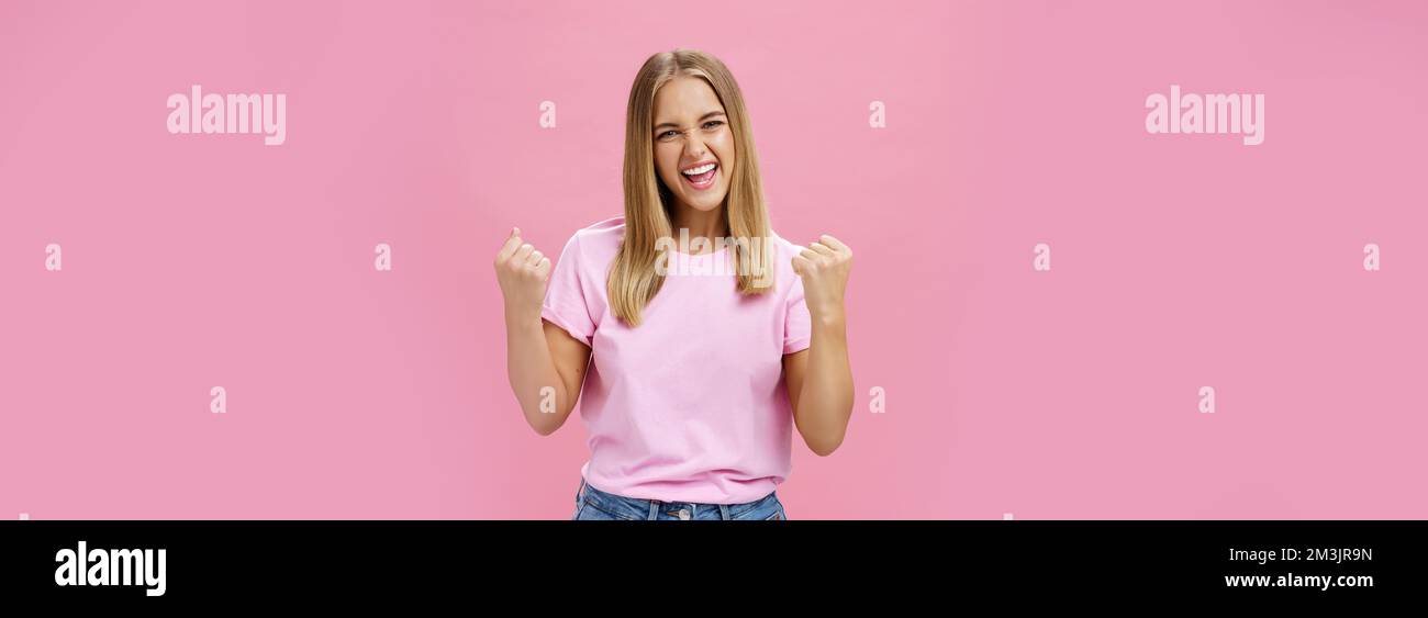 Yes I did it. Portrait of happy delighted successful young female ...