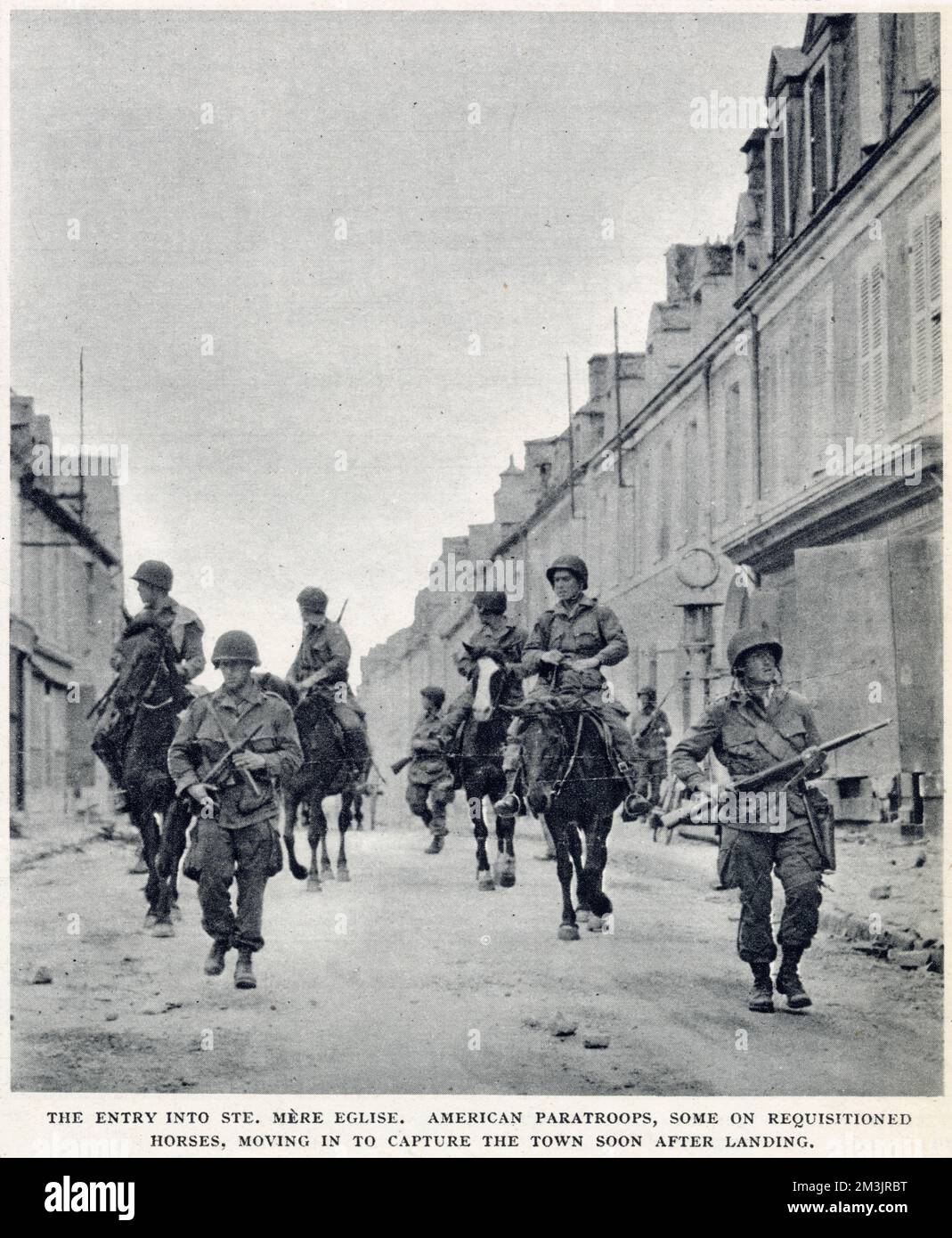 American Troops entering St. Mere Eglise, Normandy Stock Photo - Alamy
