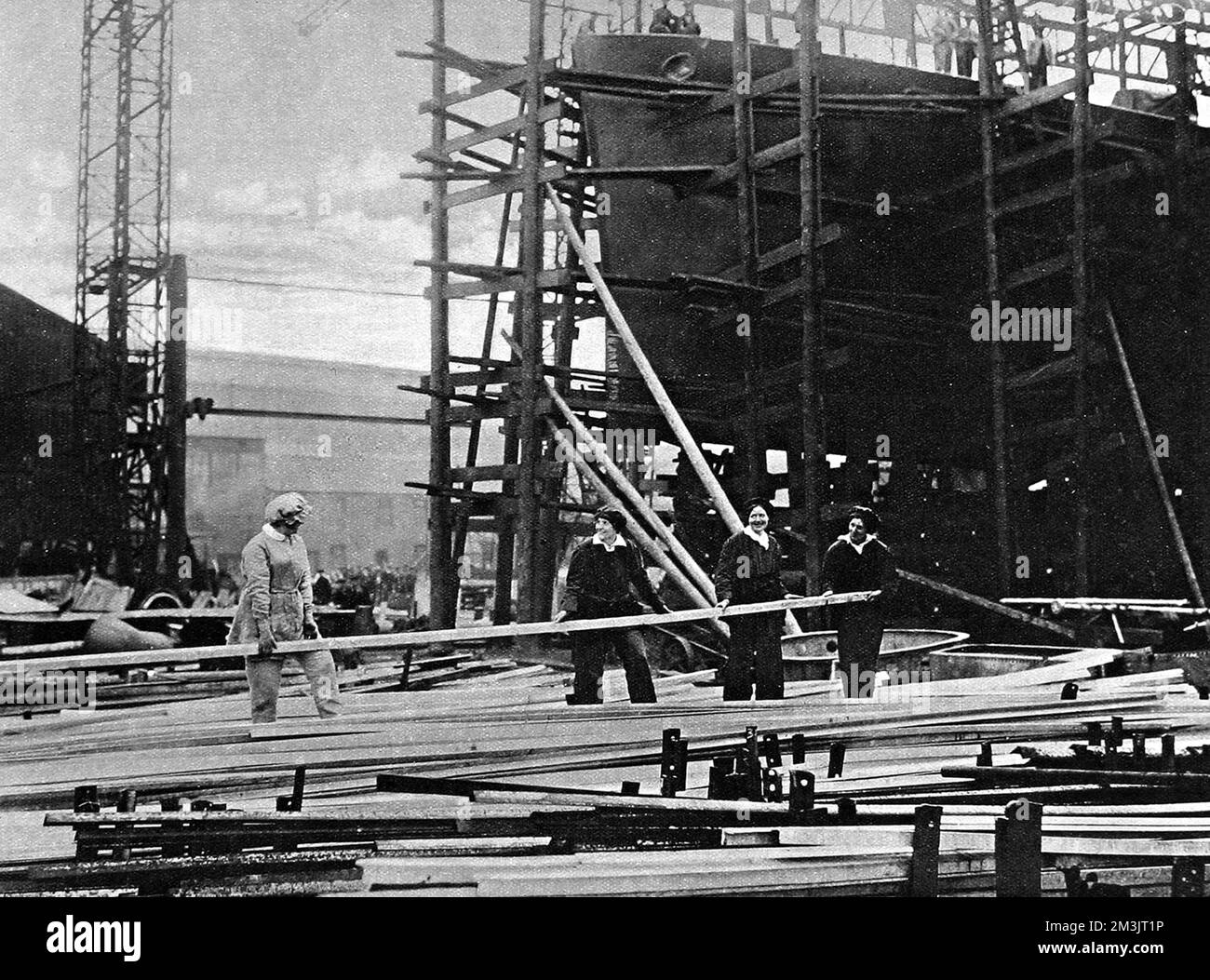 Women at work in a naval ship-building yard Stock Photo - Alamy