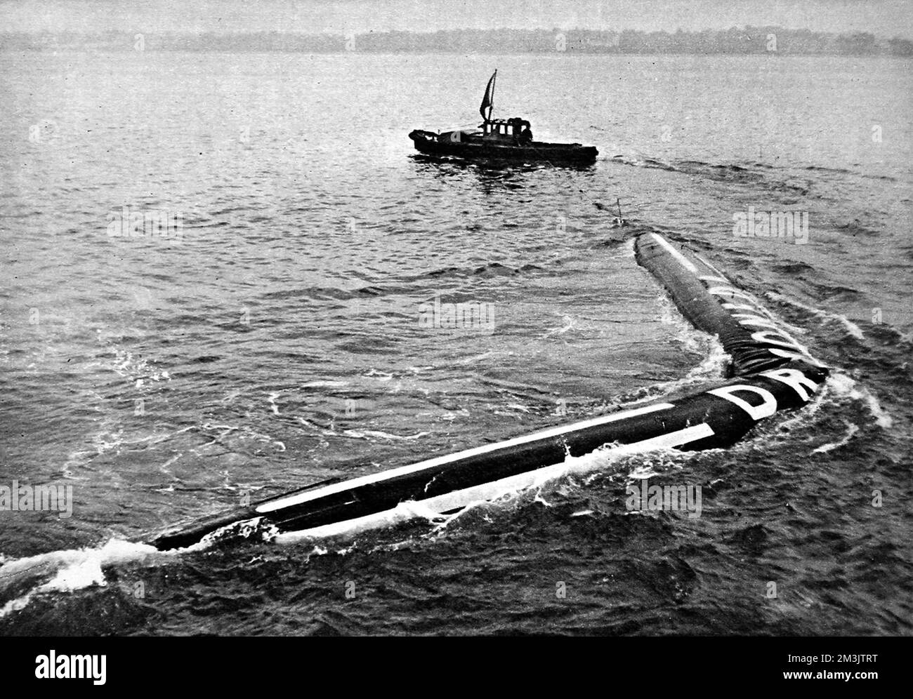 Photograph of the 'Dracone', a flexible towed trailer for the transport ...
