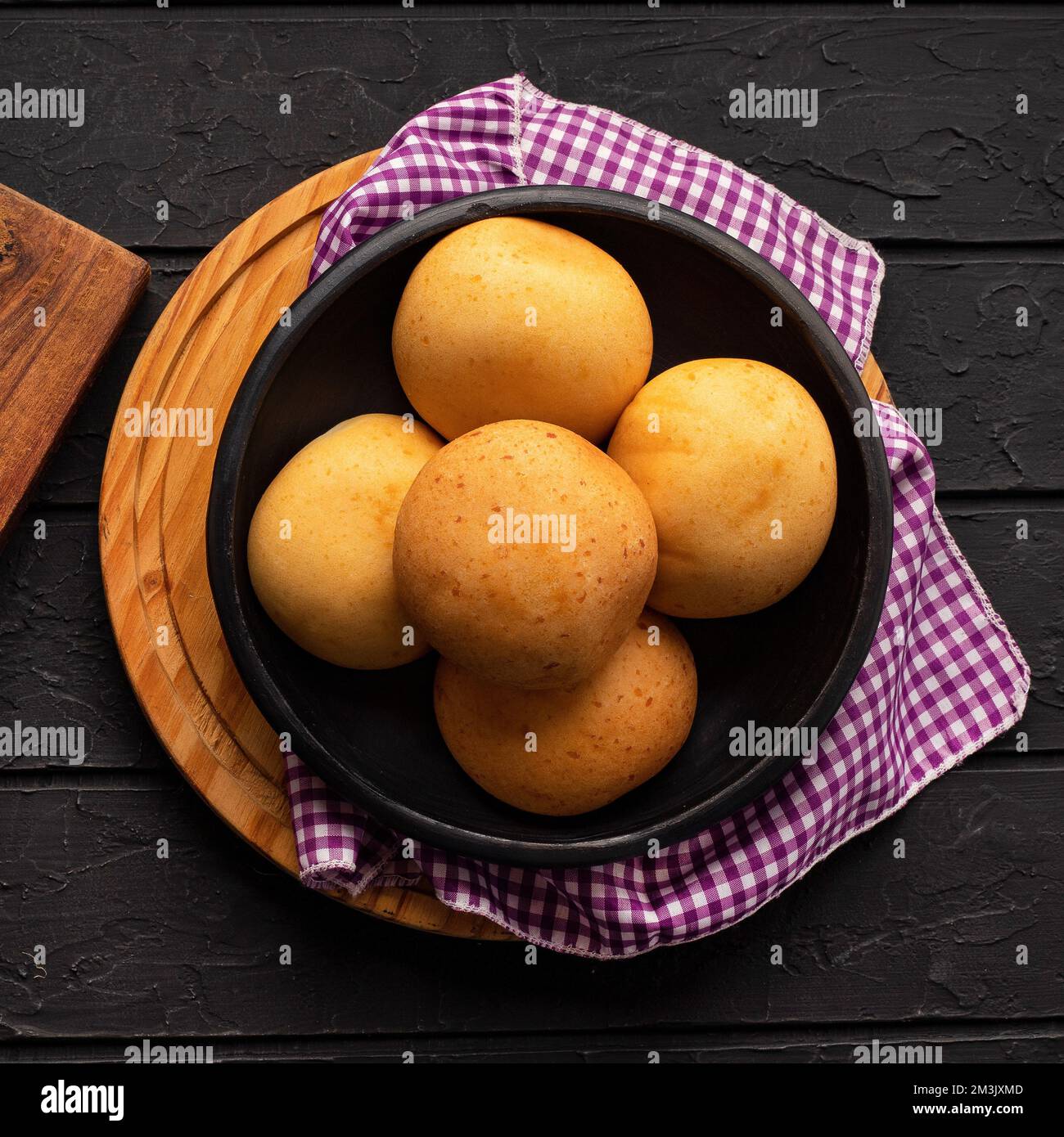 Baked almojabanas for breakfast - Typical Colombian food Stock Photo ...