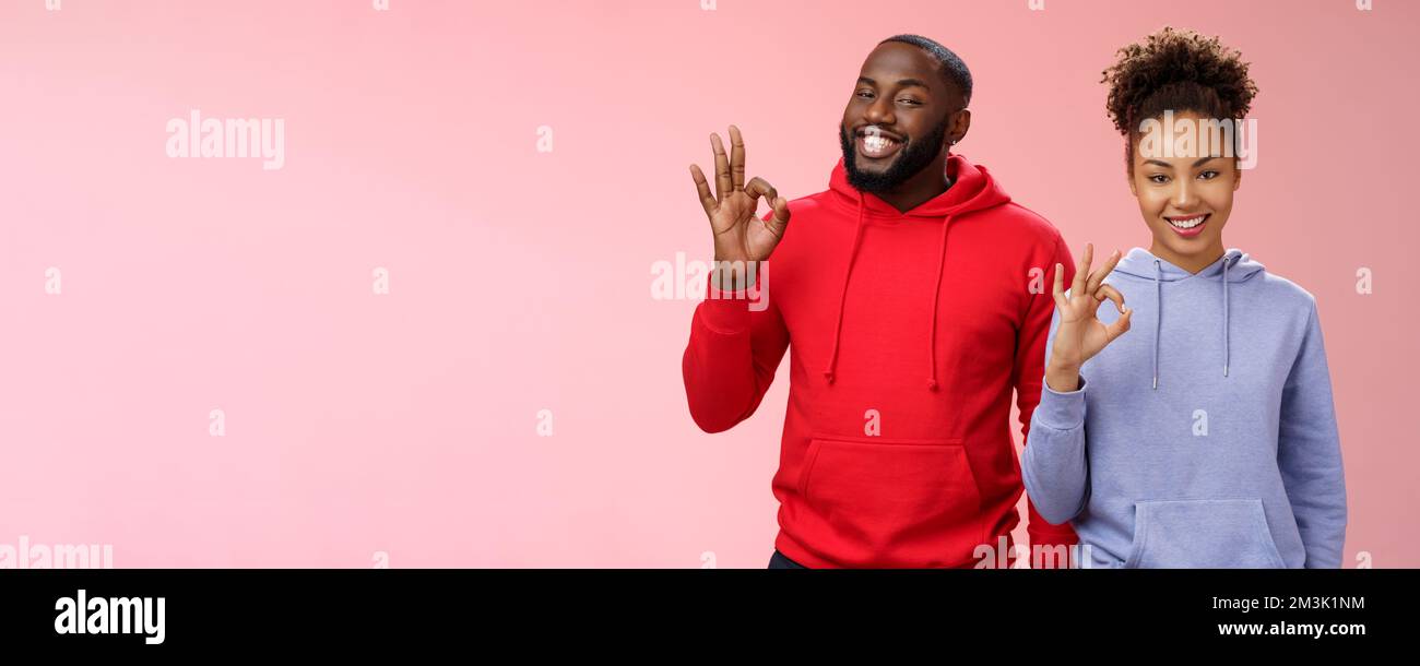 Two african-american skilful coworkers professionals assured friend ...