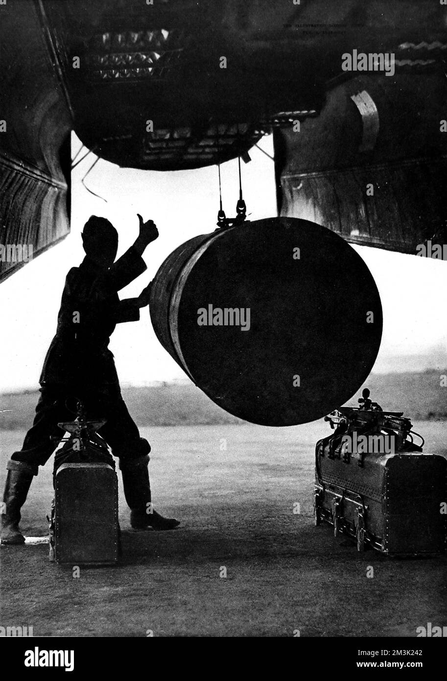 4000-lb Bomb being loaded into a Lancaster, Britain; Second Stock Photo ...