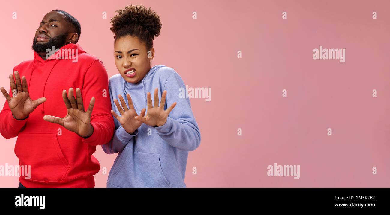 Studio shot pair african american friends woman man cringing disgust ...