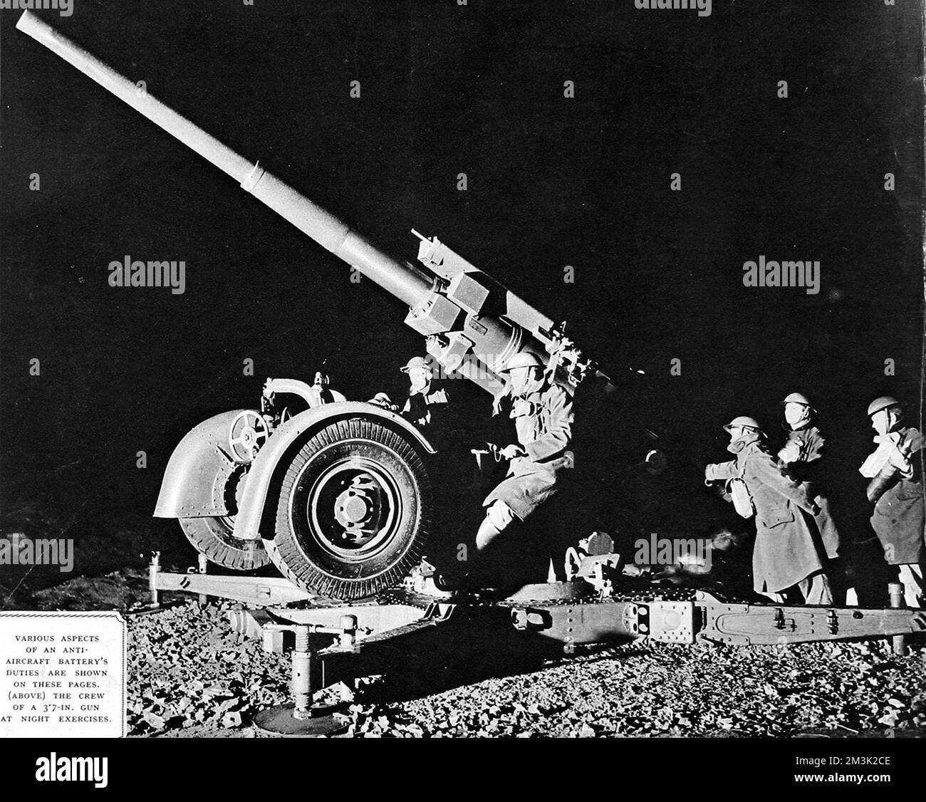 Photograph showing a British 3.7-inch anti-aircraft gun taking in part ...