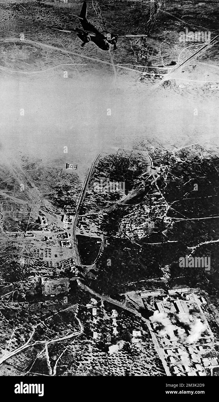 Aerial photograph showing a South African Air Force bomber attacking a ...