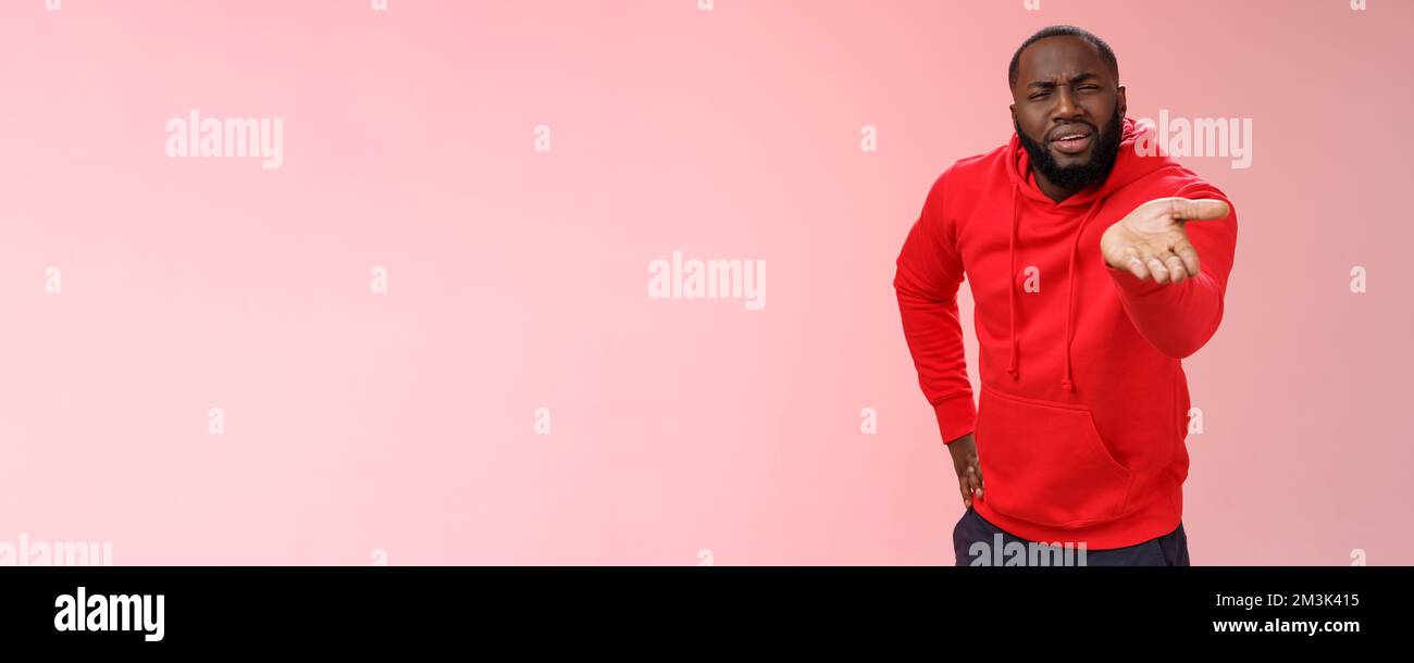 Displeased african-american man scolding friend acting bad asking what ...