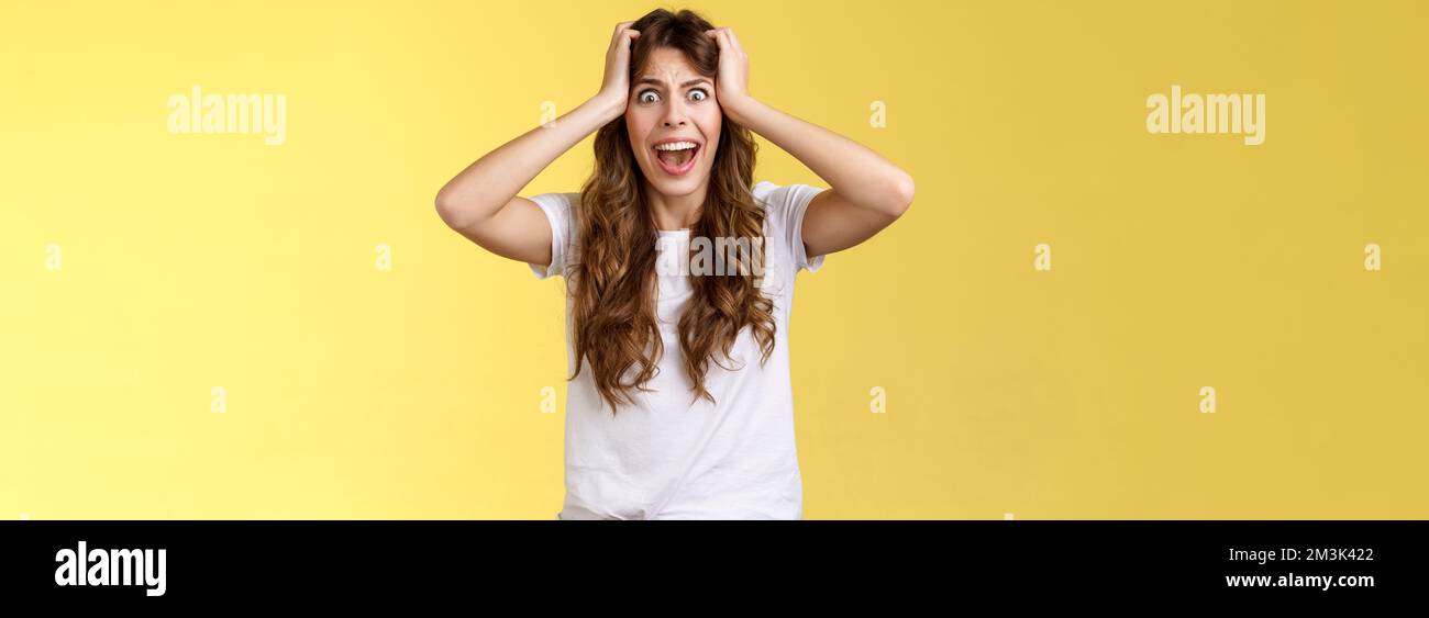 Girl screaming panic. Troubled distressed anxious woman see huge mess ...