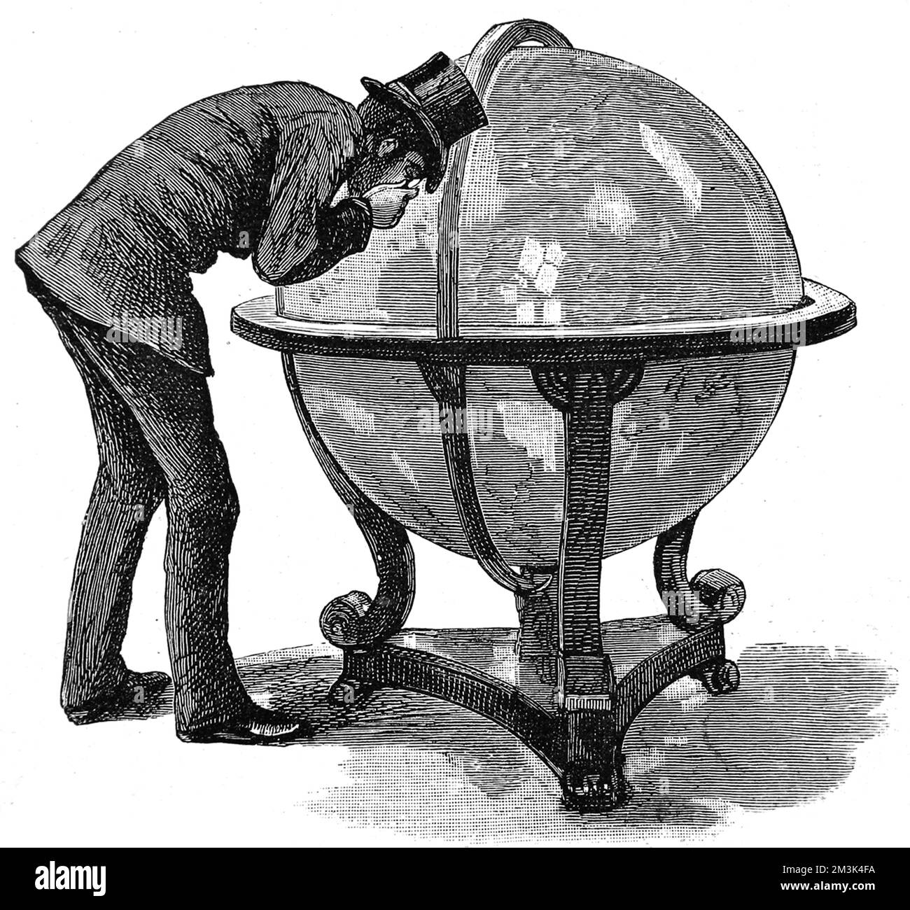 A Lloyd's of London insurance underwriter, closely examining a globe of ...