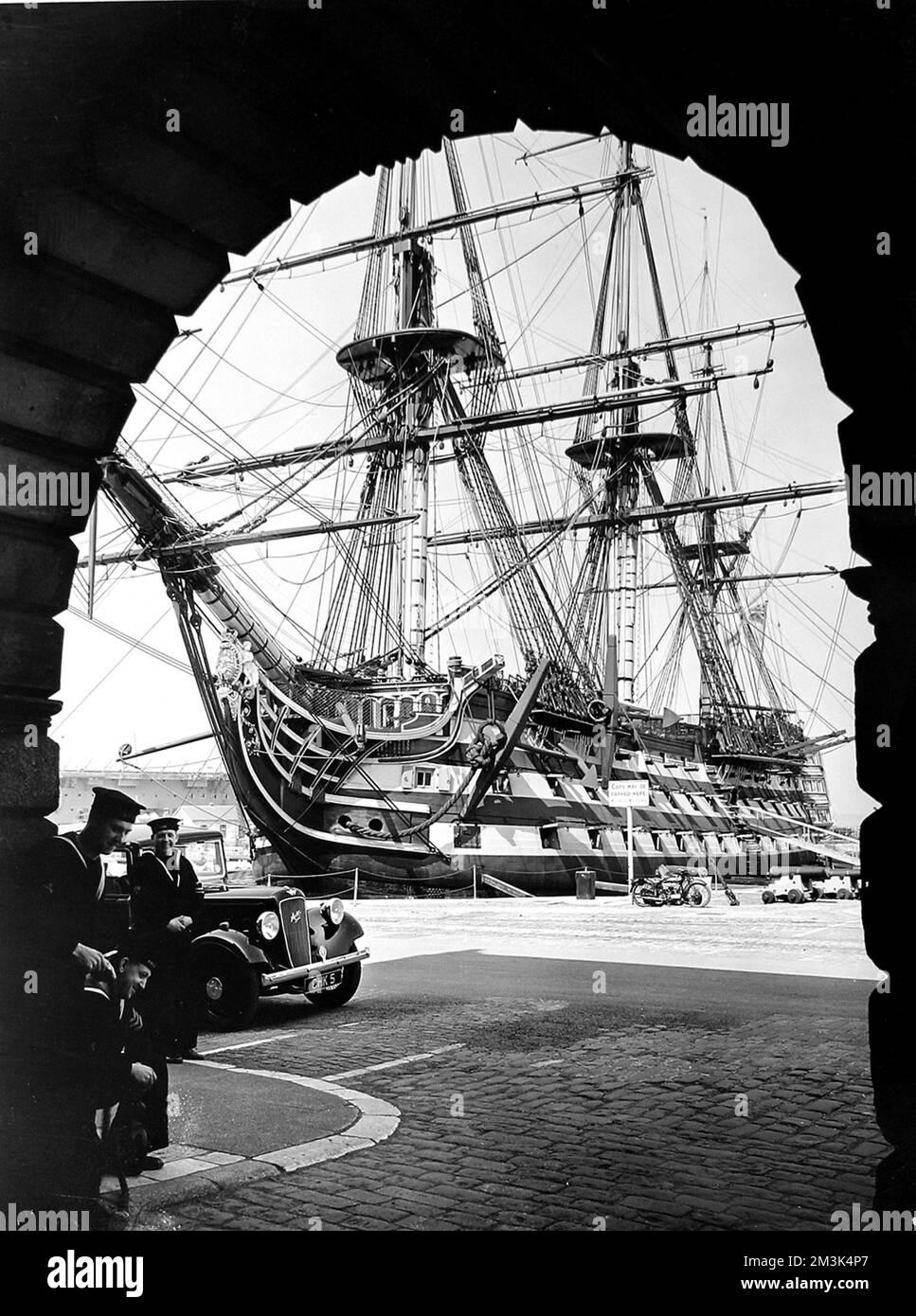 Nelson's flagship H.M.S. Victory seen through an archway as it sits on ...