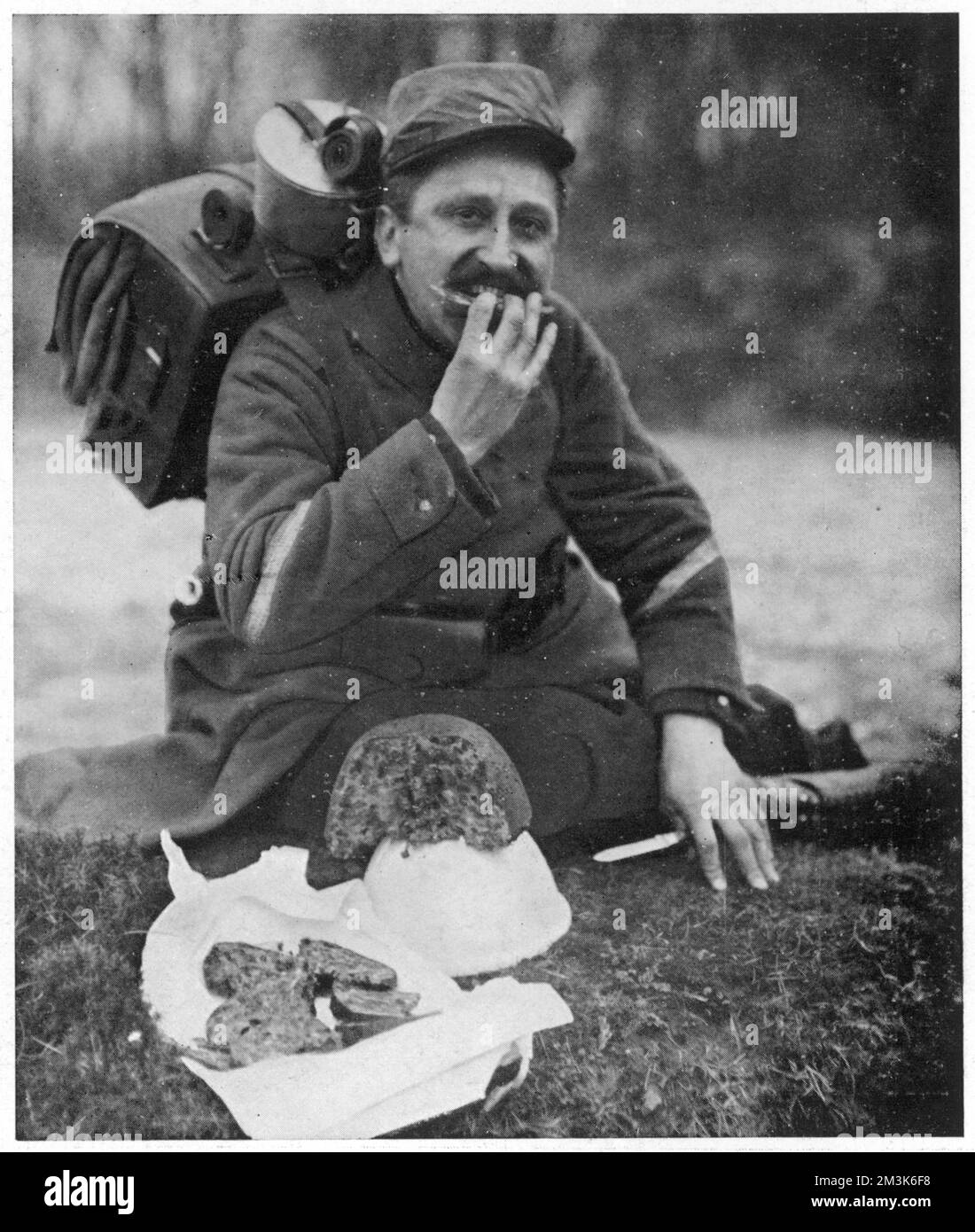 French soldier eating Christmas pudding by the wayside; an optimistic ...