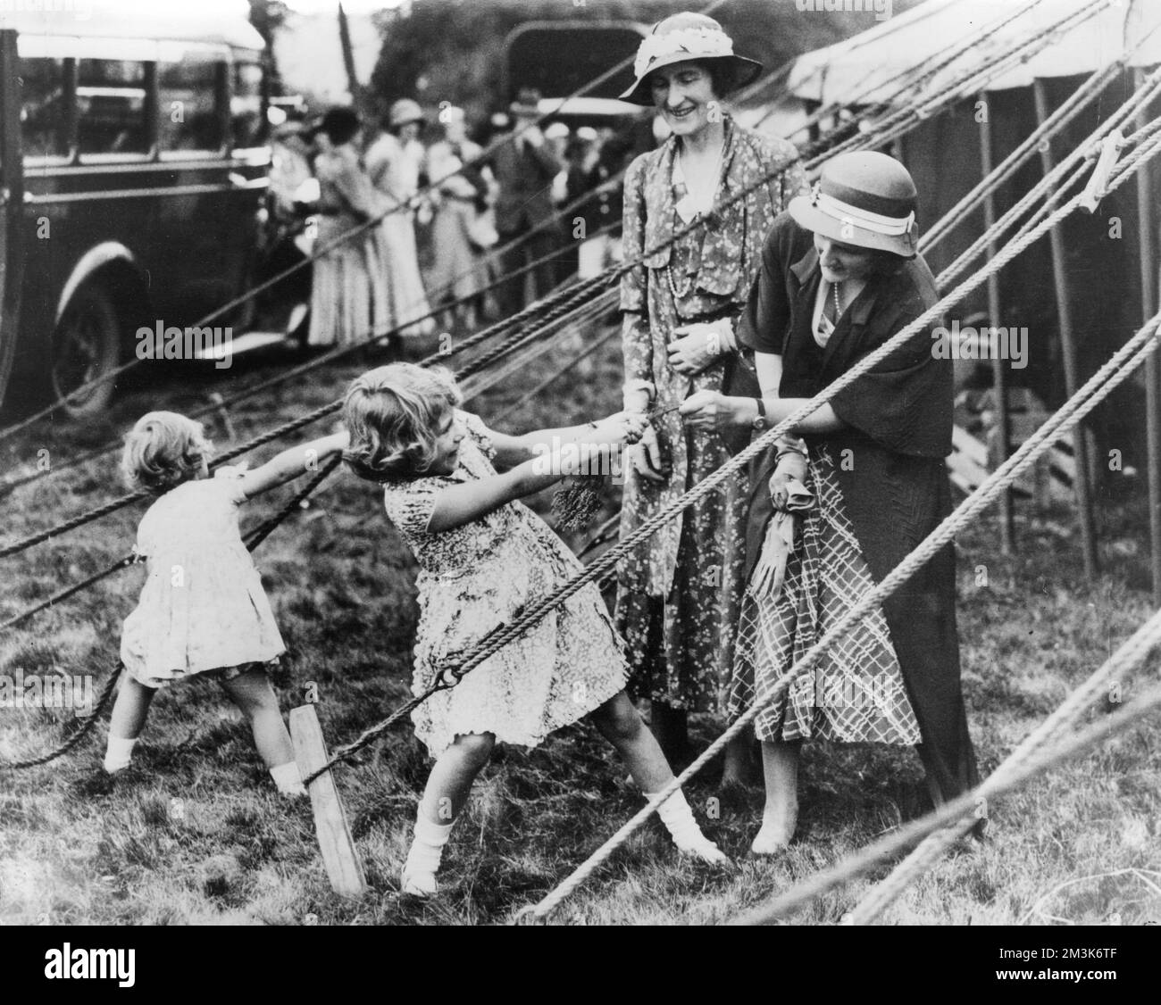 Princess Elizabeth and Princess Margaret at fete Stock Photo - Alamy