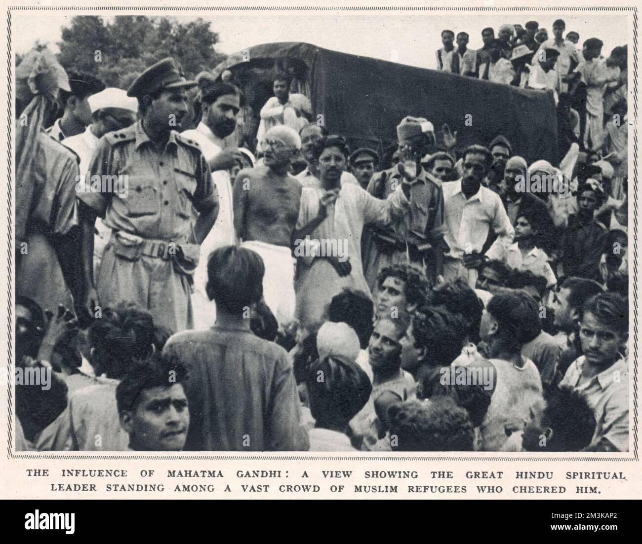 Mahatma Gandhi at Muslim refugee camp Stock Photo - Alamy
