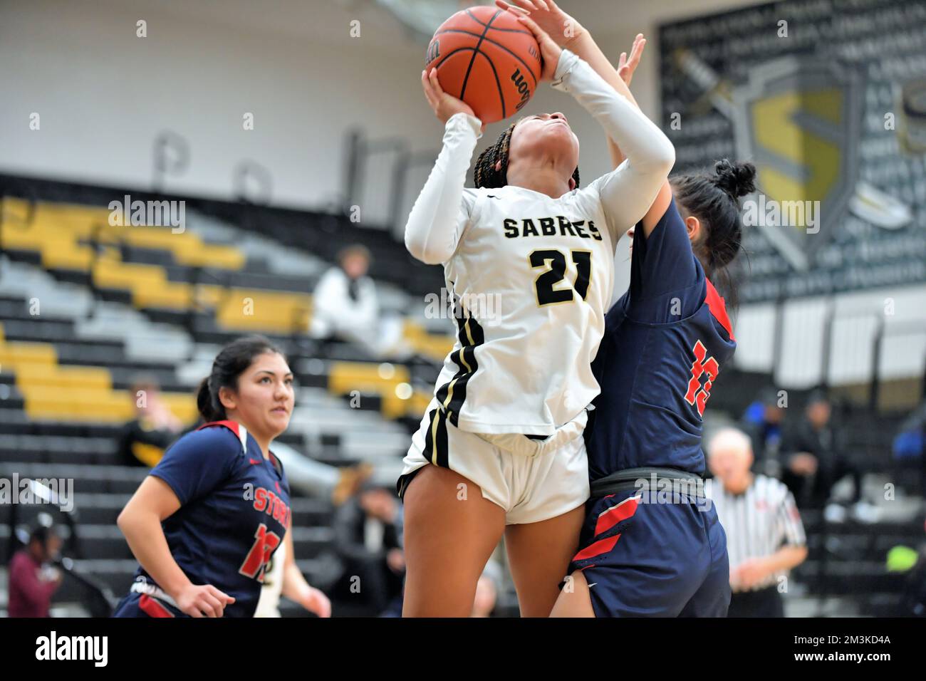 USA. Player attempting to score around the close defensive effort of an ...