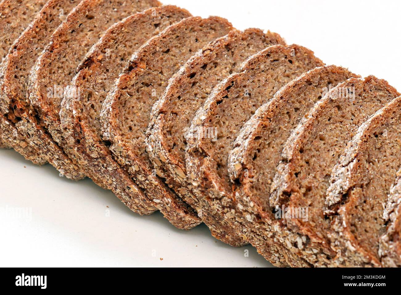 Healthy baked sliced wholemeal rye bread on white background Stock ...