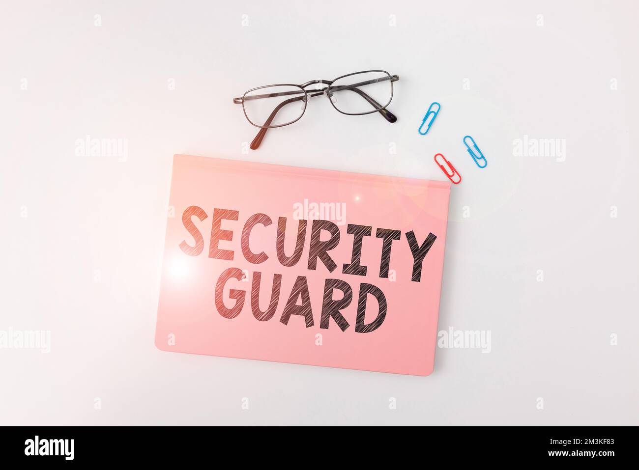 Hand writing sign Security Guard, Business idea tools used to manage ...