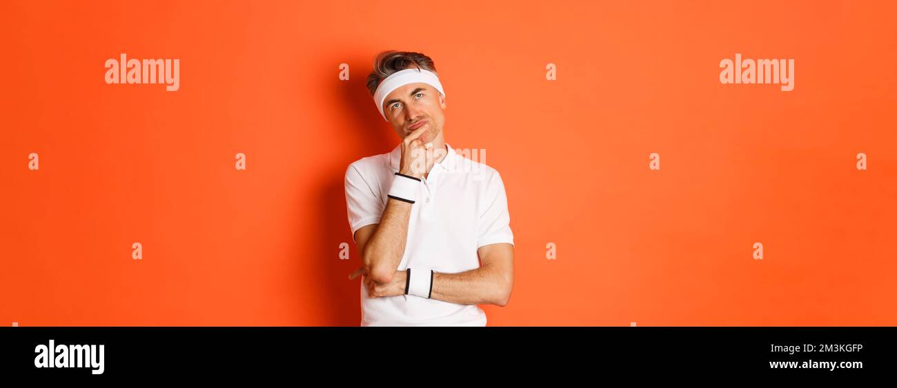 Concept of sport, fitness and lifestyle. Portrait of thoughtful male ...