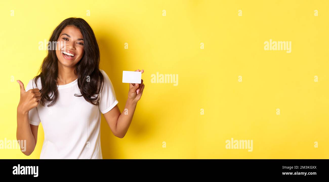 Portrait of good-looking african american woman in white t-shirt ...